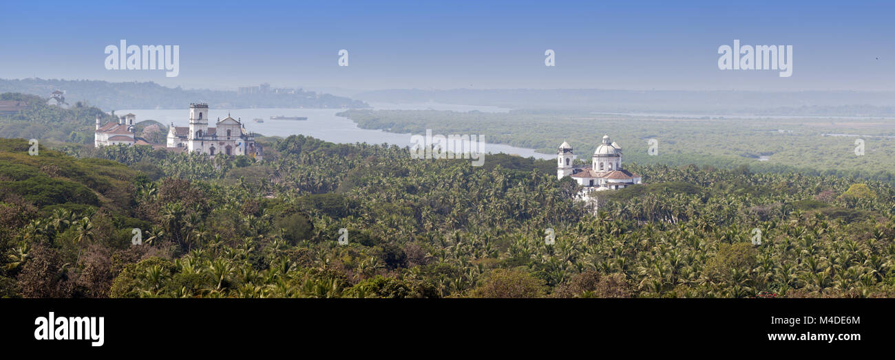 Aerial panoramic view Old Goa. Mandovi river and ancient Churches Stock ...