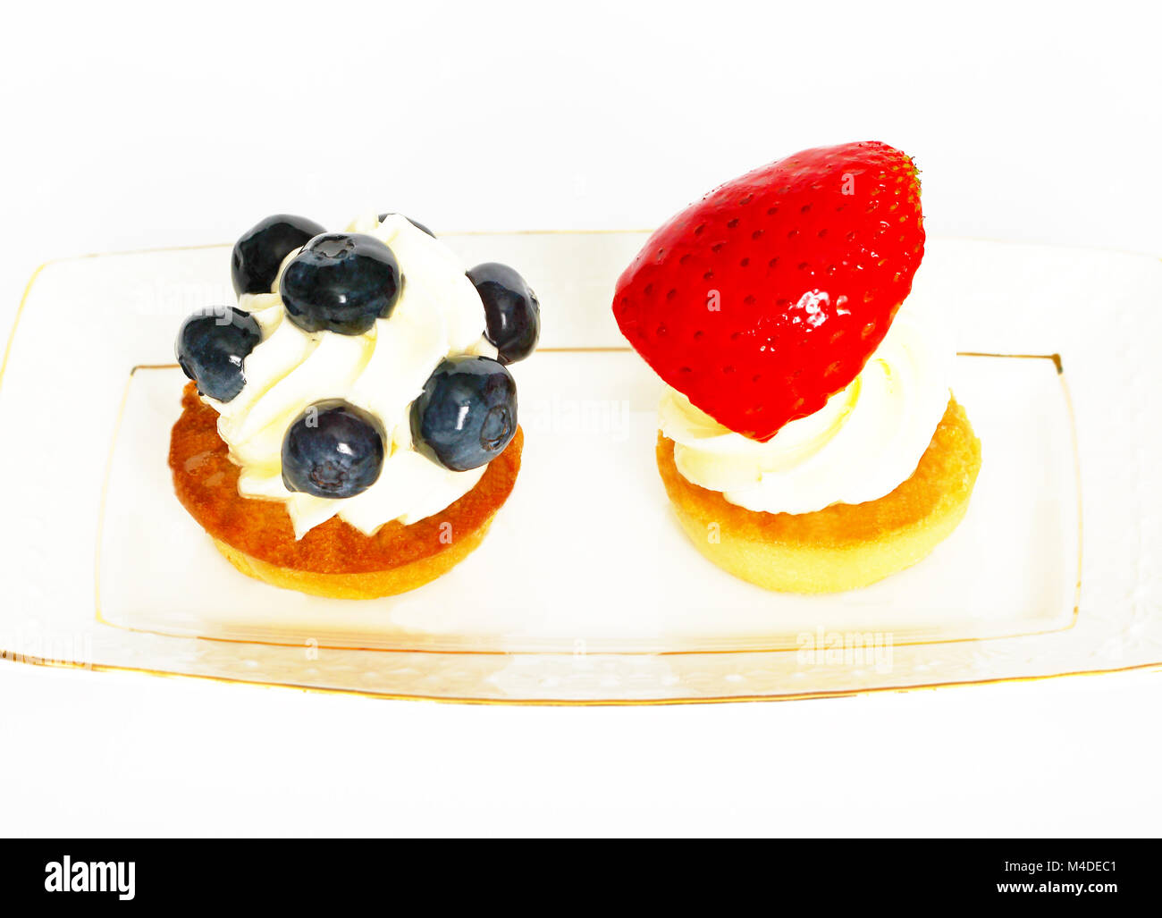 Beautiful small cake on white background Stock Photo - Alamy