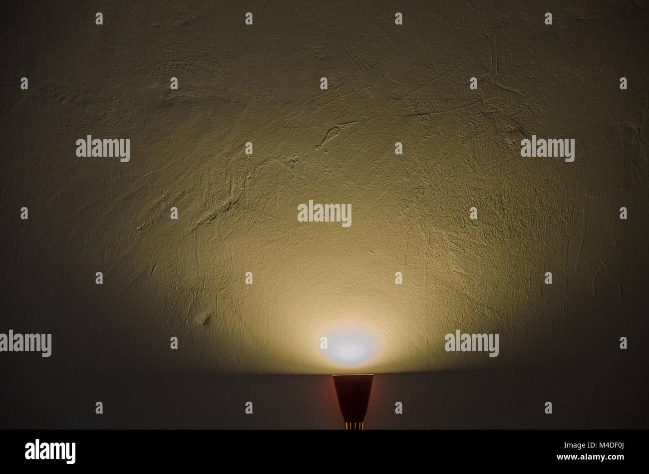 Vintage background with lighting retro lamp on wall Stock Photo - Alamy