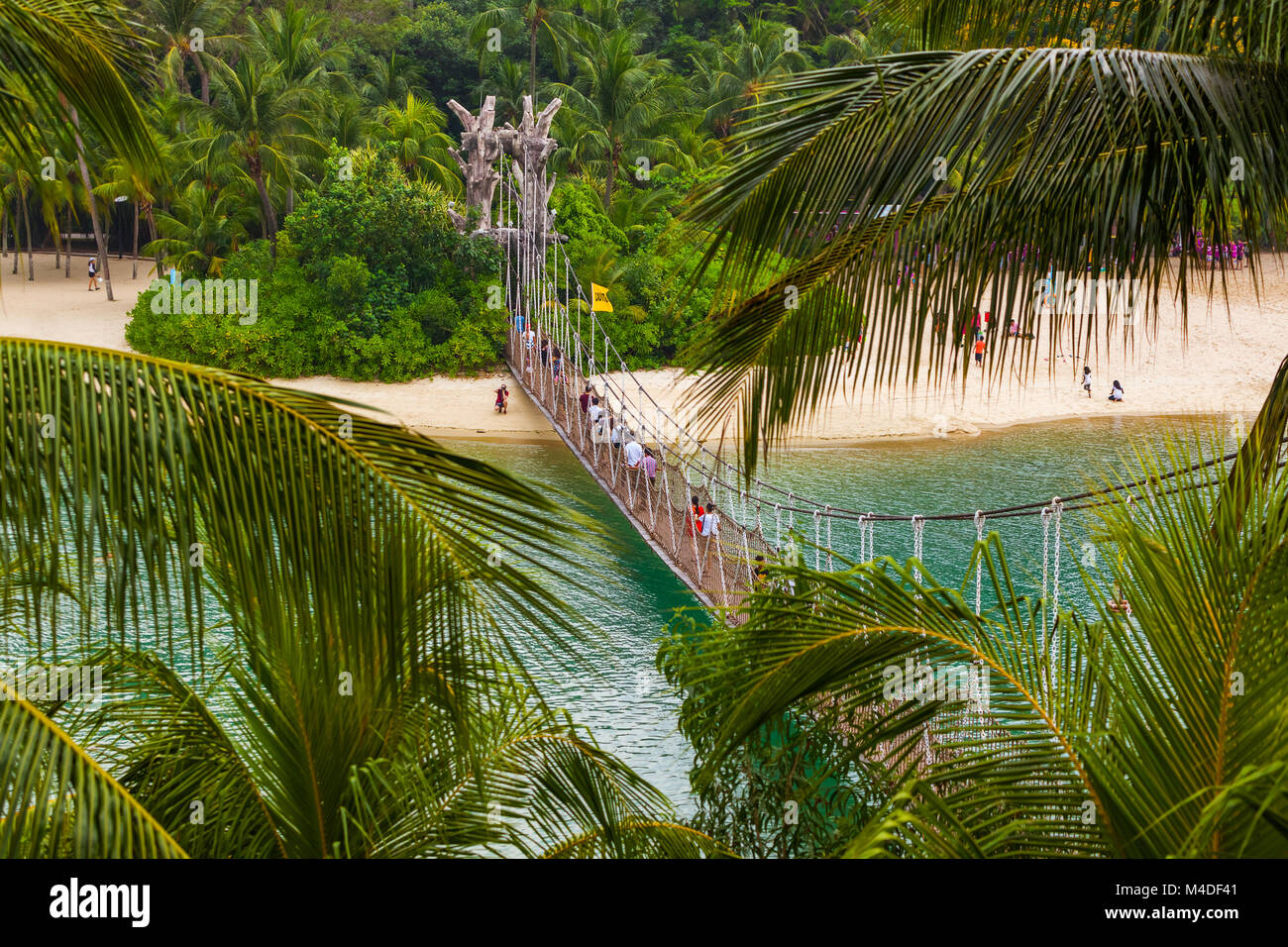 Hanging bridge to Palawan island in Sentosa Singapore Stock Photo - Alamy