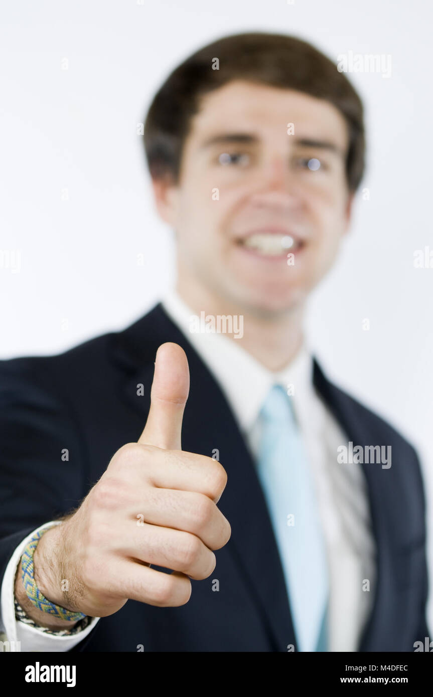 manager thumbs up and smiling Stock Photo - Alamy