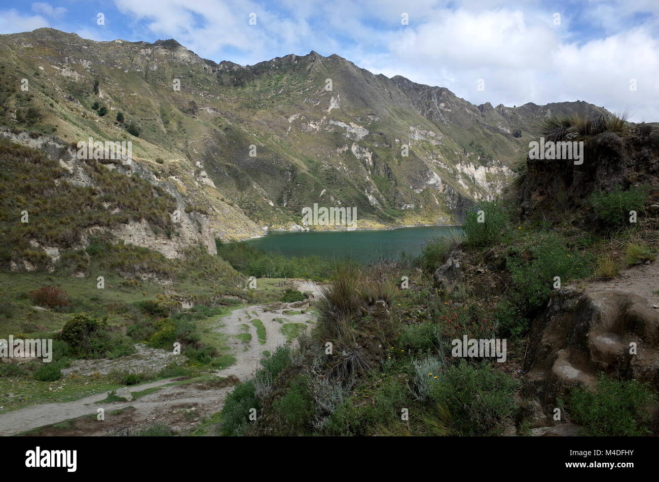 A view of Quilotoa Lake, an ancient volcano and starting point for the ...