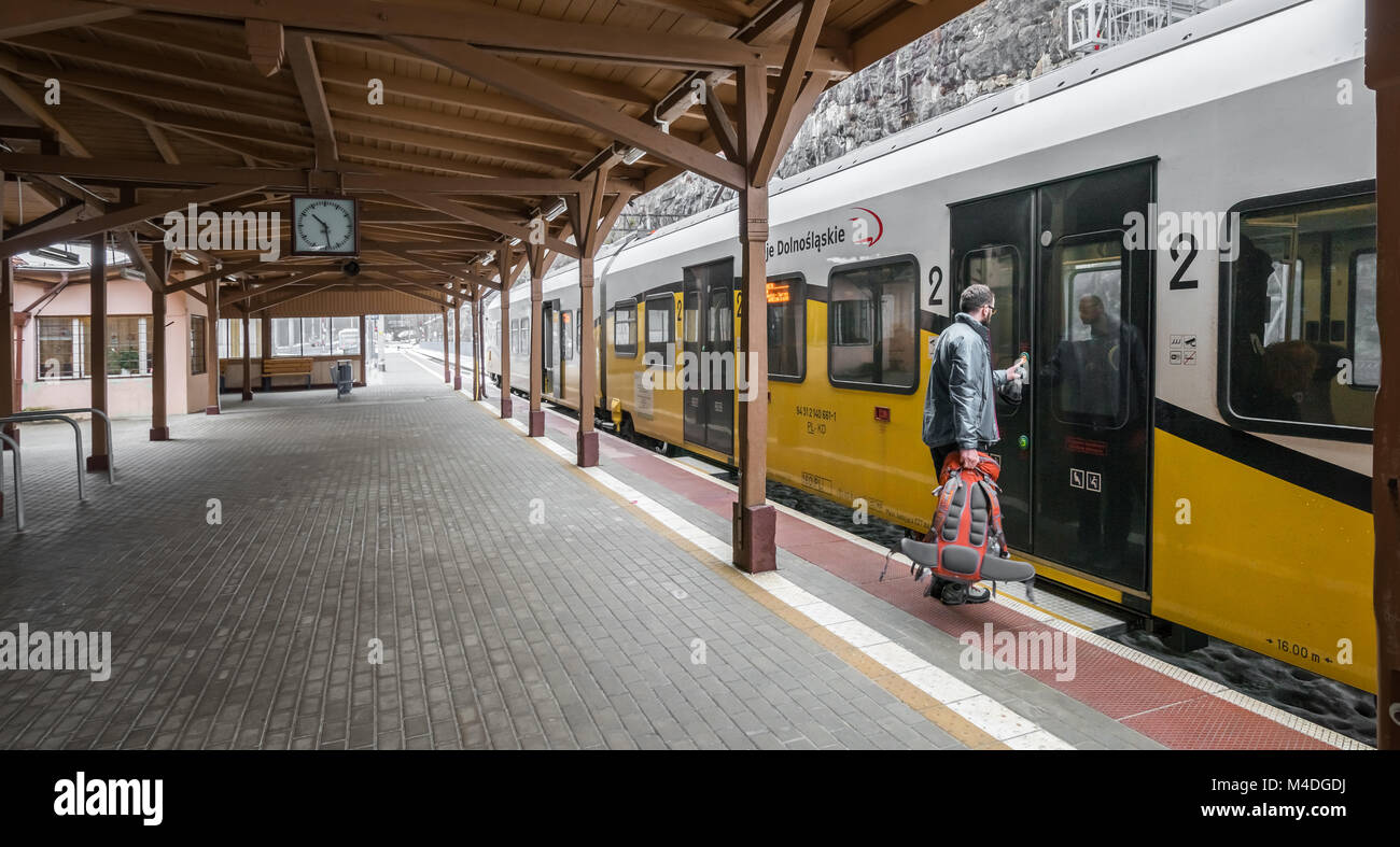 Man boarding the train Stock Photo - Alamy