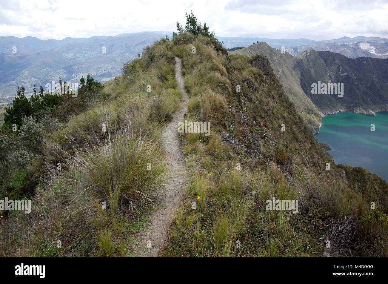 A view of Quilotoa Lake, an ancient volcano and starting point for the ...
