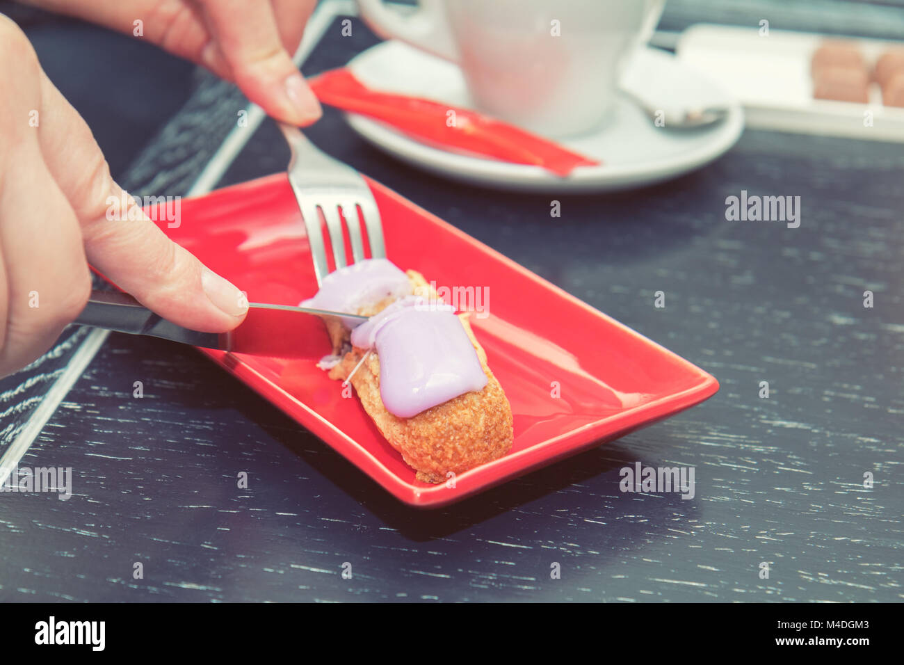 Woman eating cake black hi-res stock photography and images - Alamy