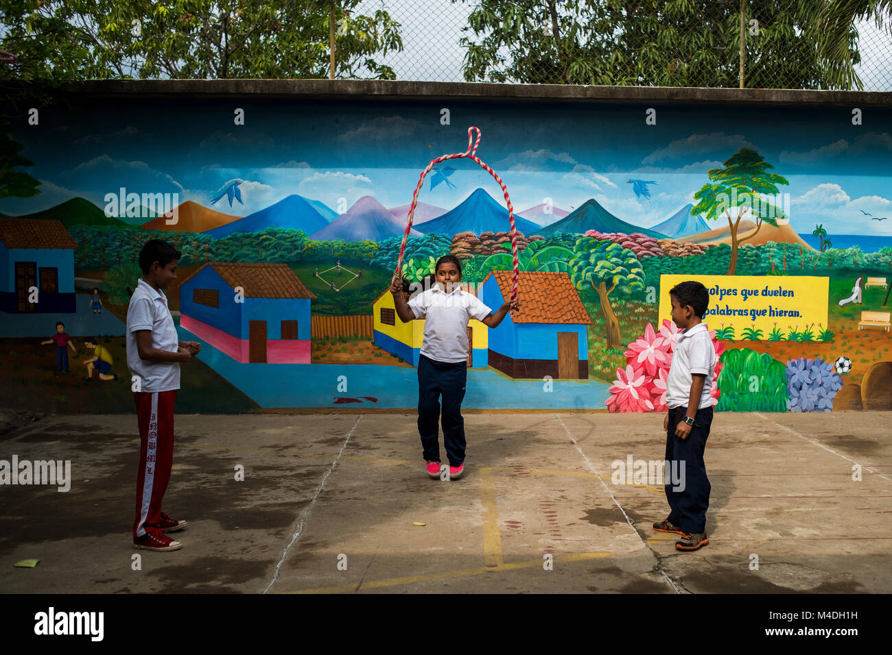 Children play jump rope at a community organization in Nicaragua Stock ...