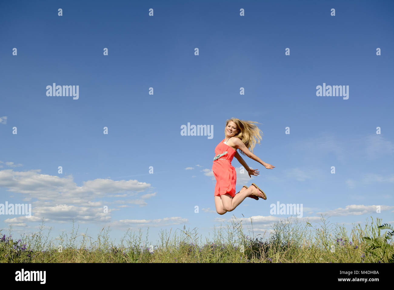 Leaping woman dress hi-res stock photography and images - Alamy