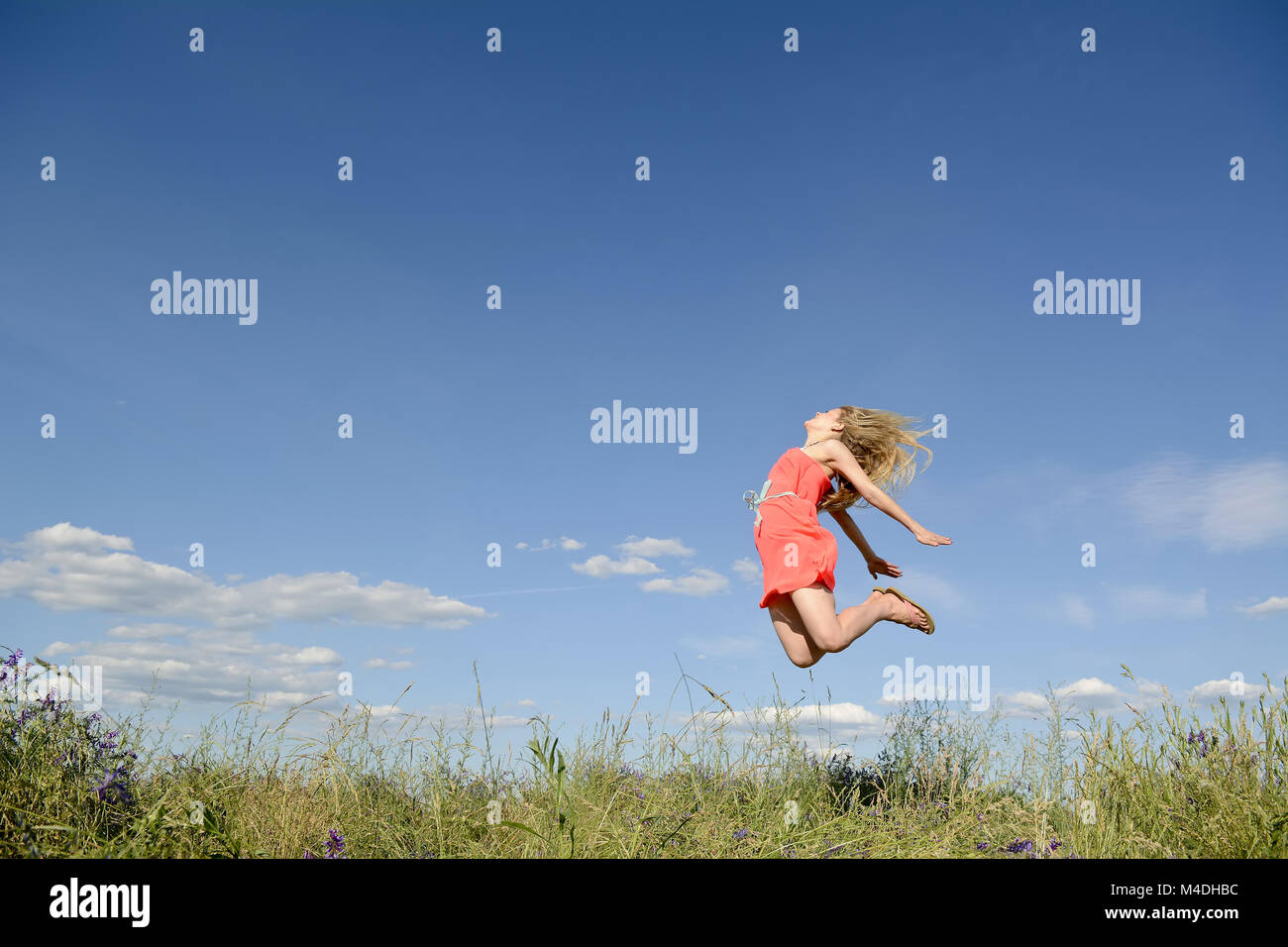 Leaping woman dress hi-res stock photography and images - Alamy