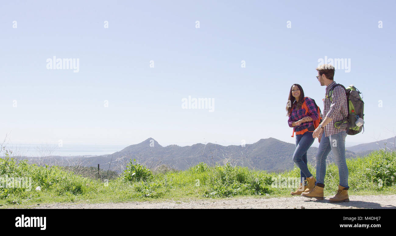Laughing couple in mountains Stock Photo - Alamy