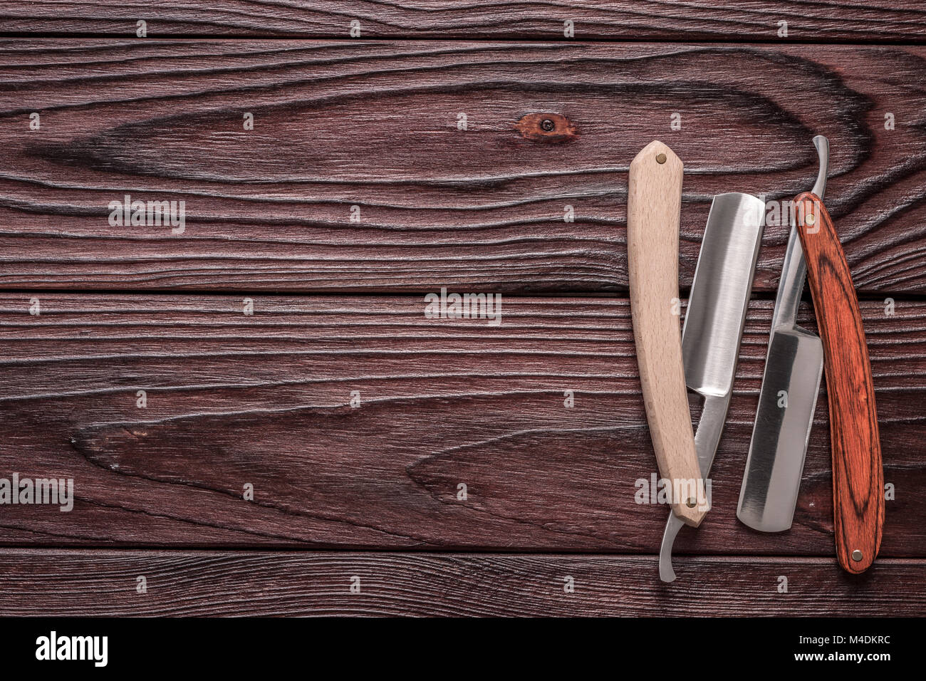 Vintage barber shop straight razor tool on wooden background Stock ...