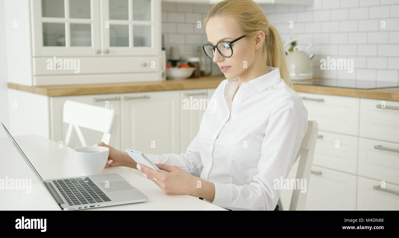 Young woman modern devices hi-res stock photography and images - Alamy