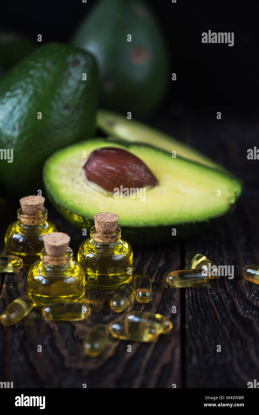 Oil of avocado and fish oil Stock Photo - Alamy