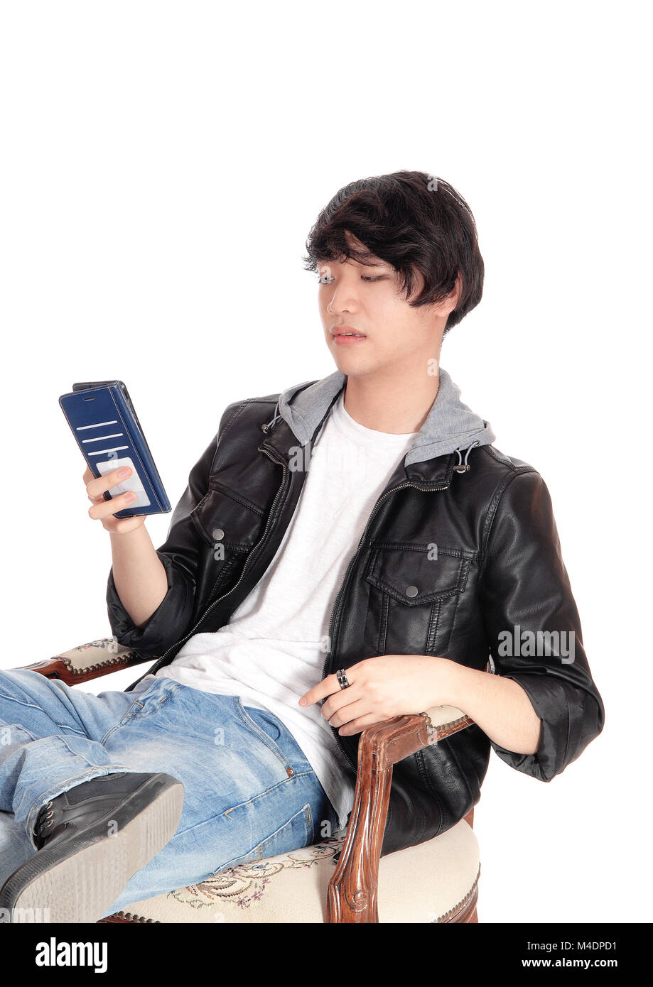 Asian man talking on his cellphone Stock Photo - Alamy