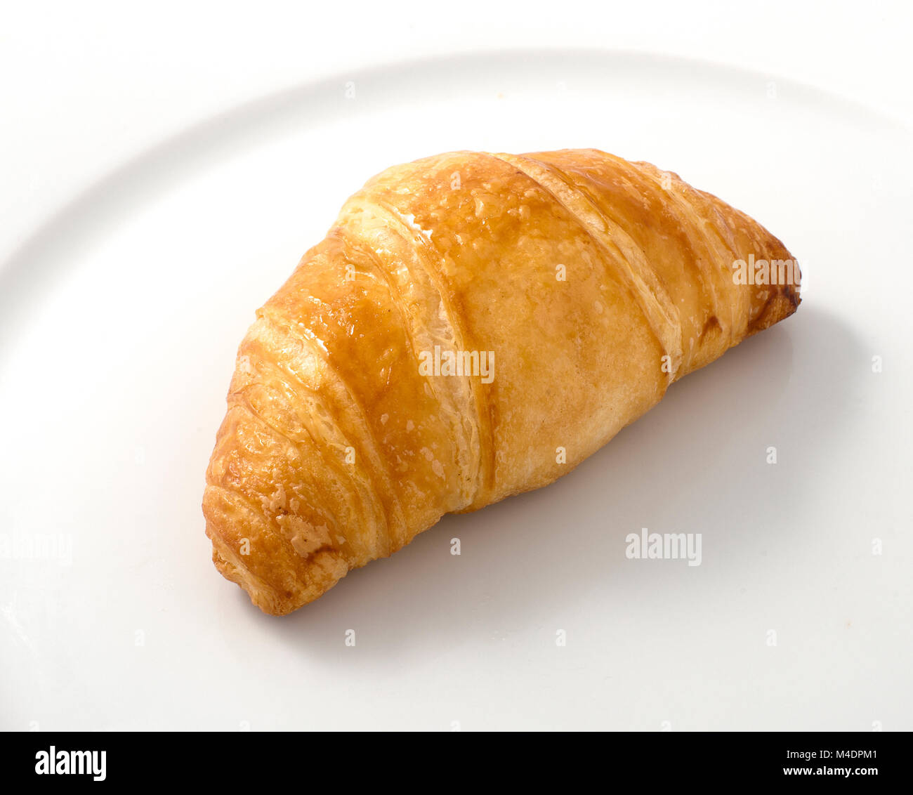 Plain croissant isolated on white Stock Photo - Alamy