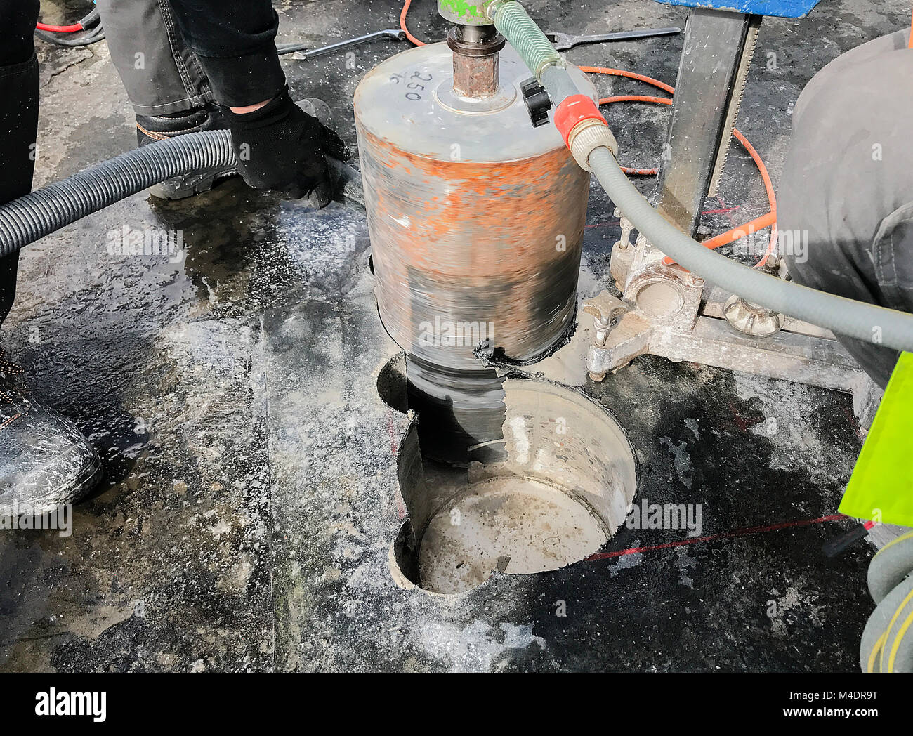 Core drilling through a building ceiling Stock Photo - Alamy