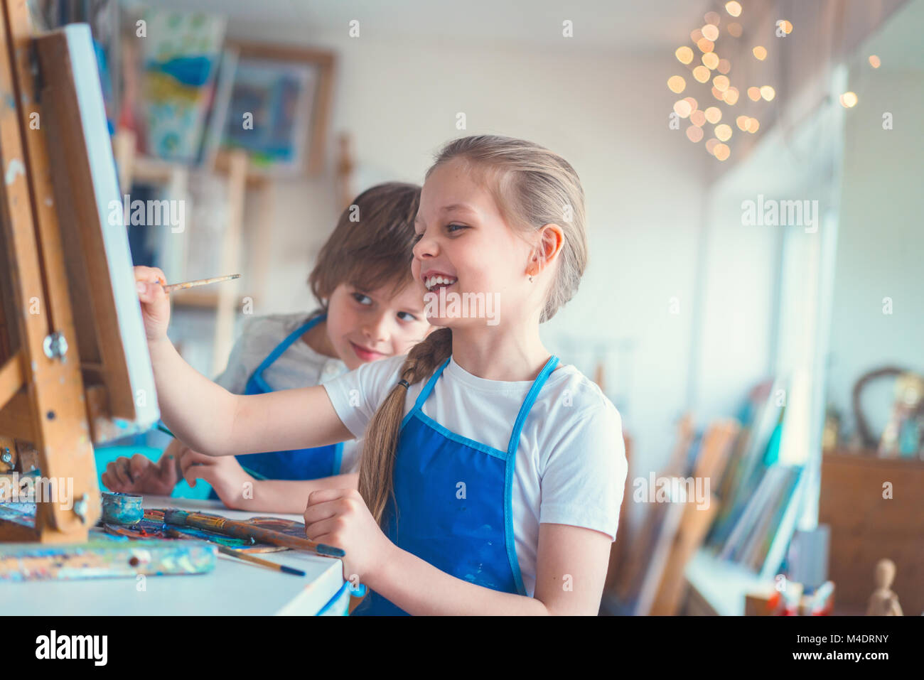 School child painting hi-res stock photography and images - Alamy