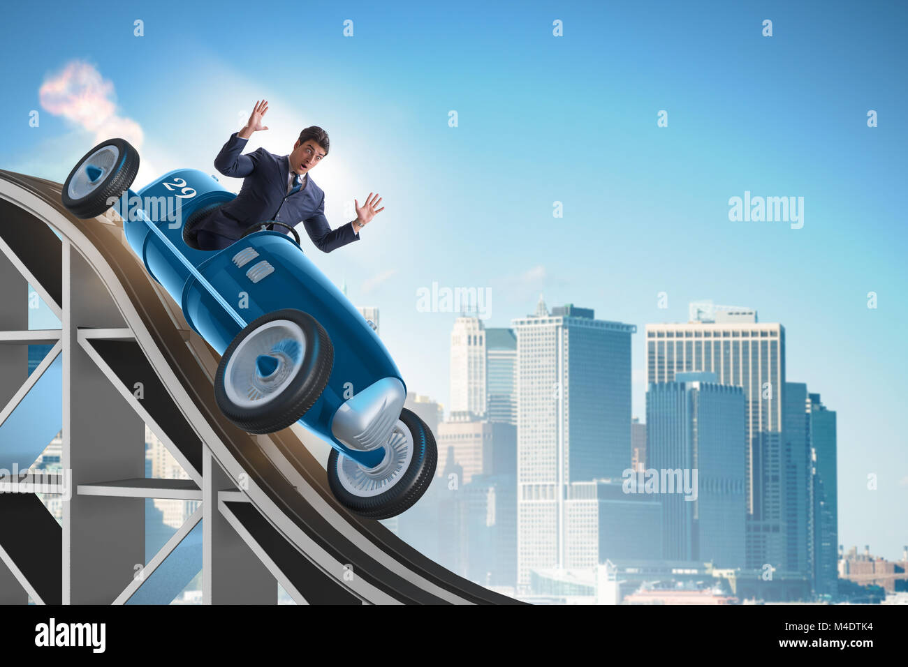 Businessman driving sports car on roller coaster Stock Photo - Alamy