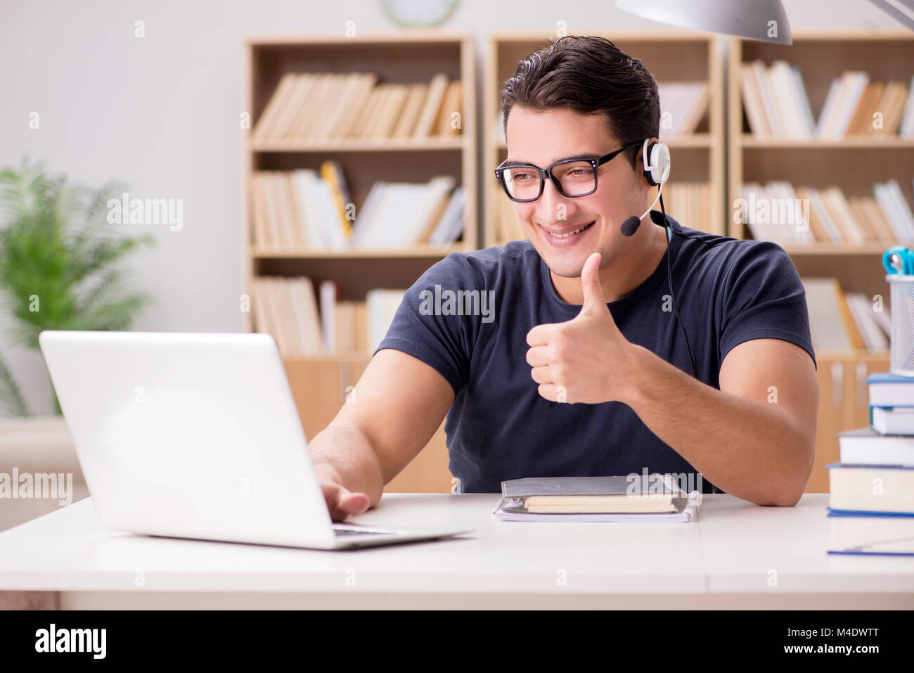 Young freelance worked working on computer Stock Photo - Alamy