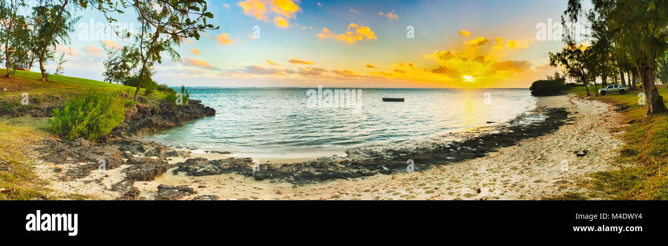 Beautiful beach at sunset. Panorama Stock Photo - Alamy