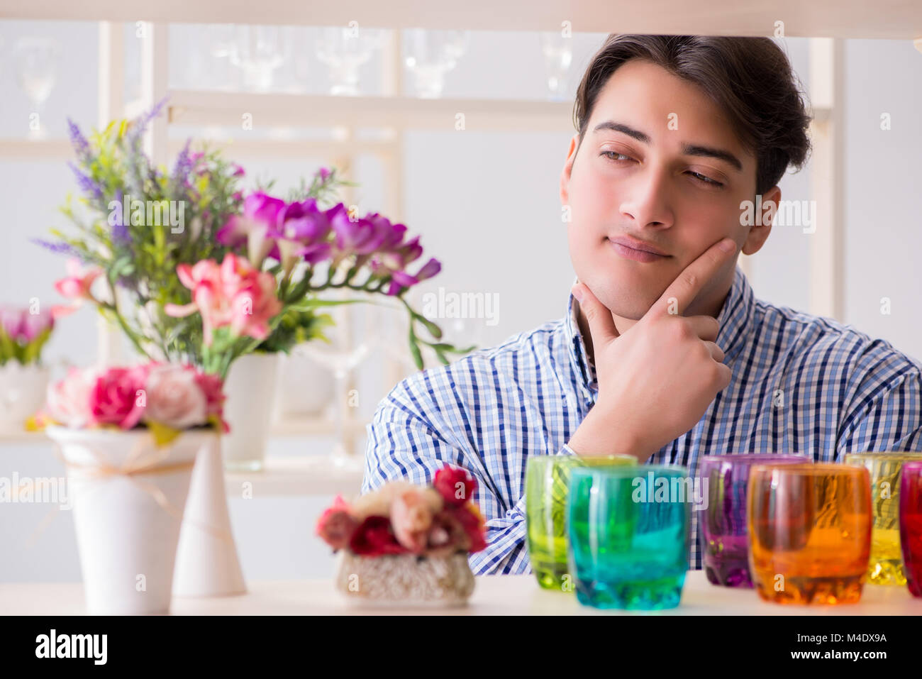 Young handsome man shopping in shop Stock Photo - Alamy