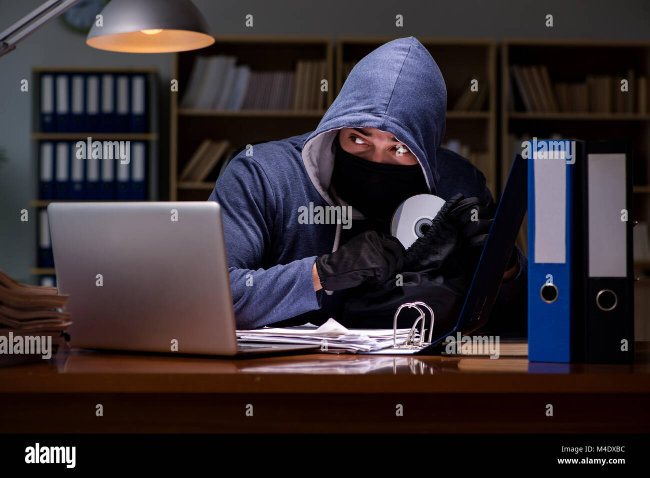Hacker stealing personal data from home computer Stock Photo - Alamy