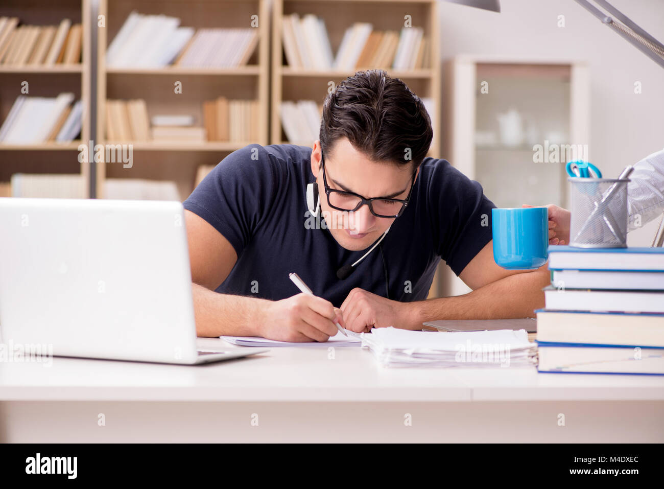 Young freelance worked working on computer Stock Photo - Alamy