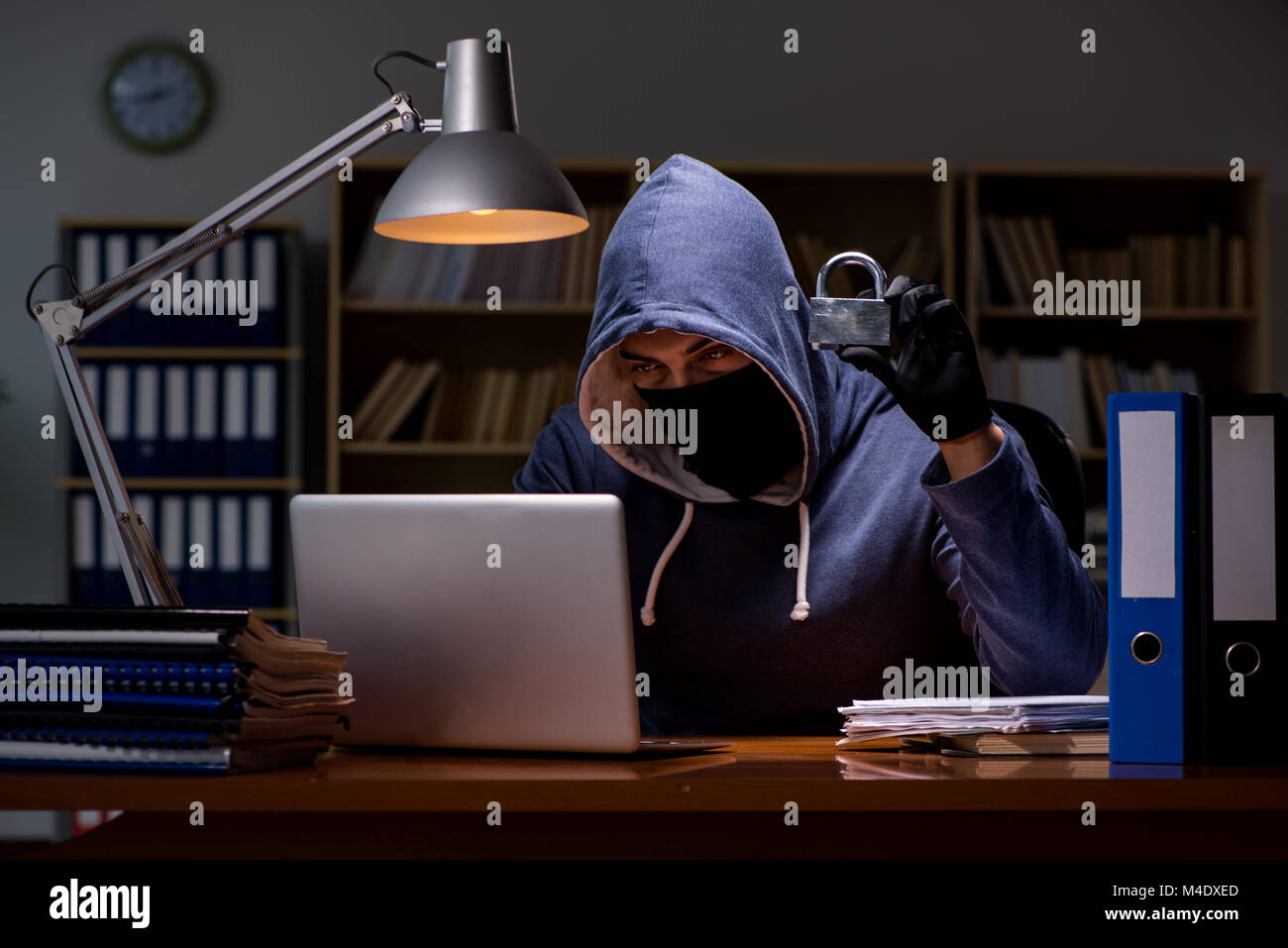 Hacker stealing personal data from home computer Stock Photo - Alamy