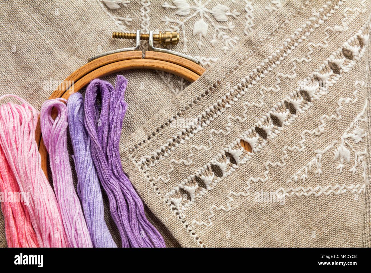 Set for embroidery with thread violet color Stock Photo - Alamy