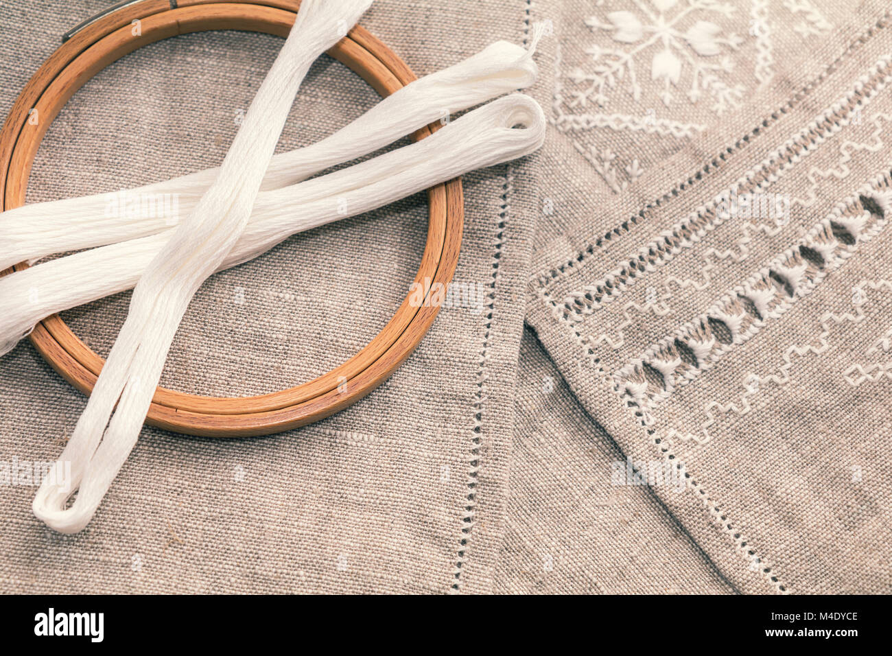 Set for embroidery with thread white color Stock Photo - Alamy