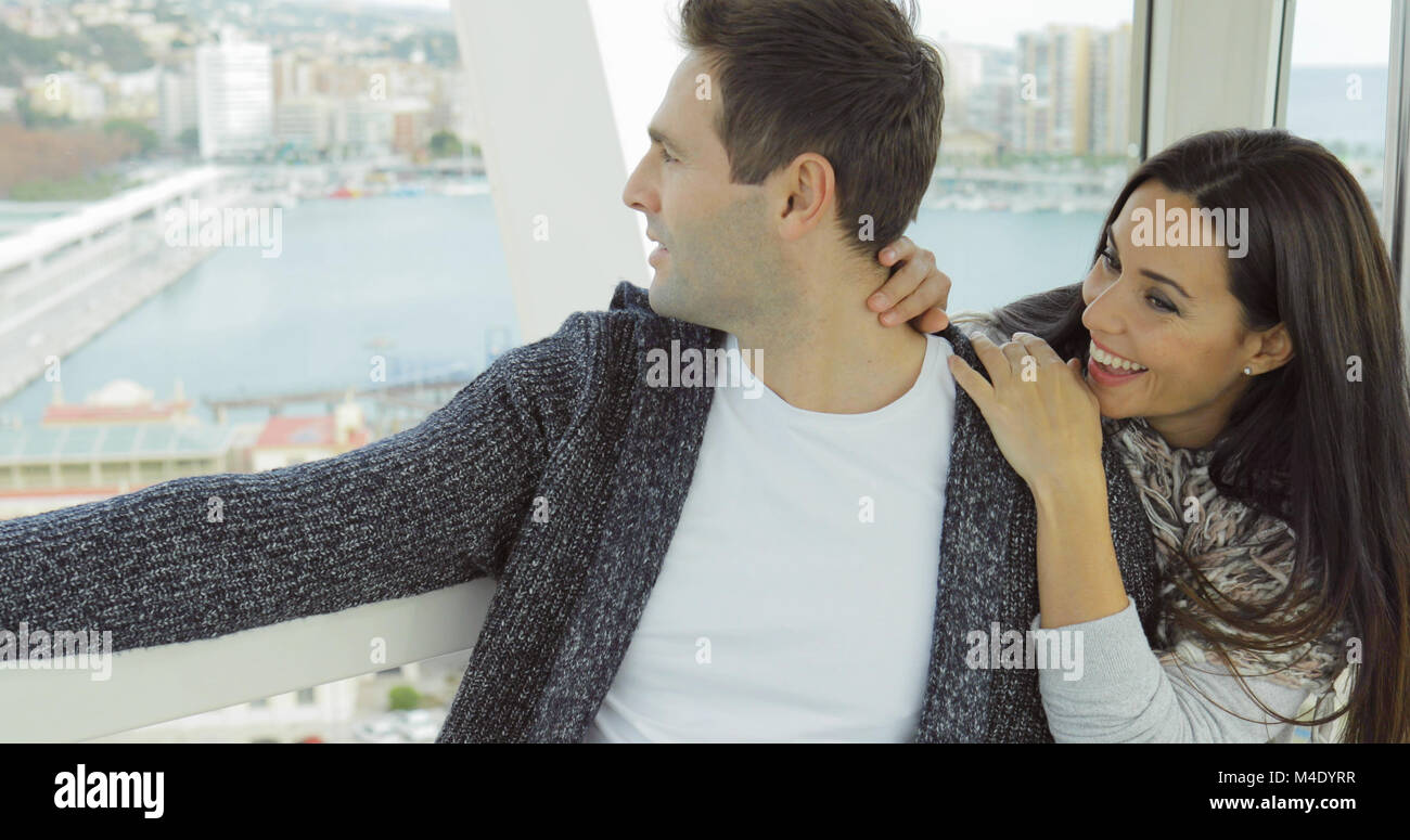 Couple sightseeing on a cable car or ferris wheel Stock Photo - Alamy