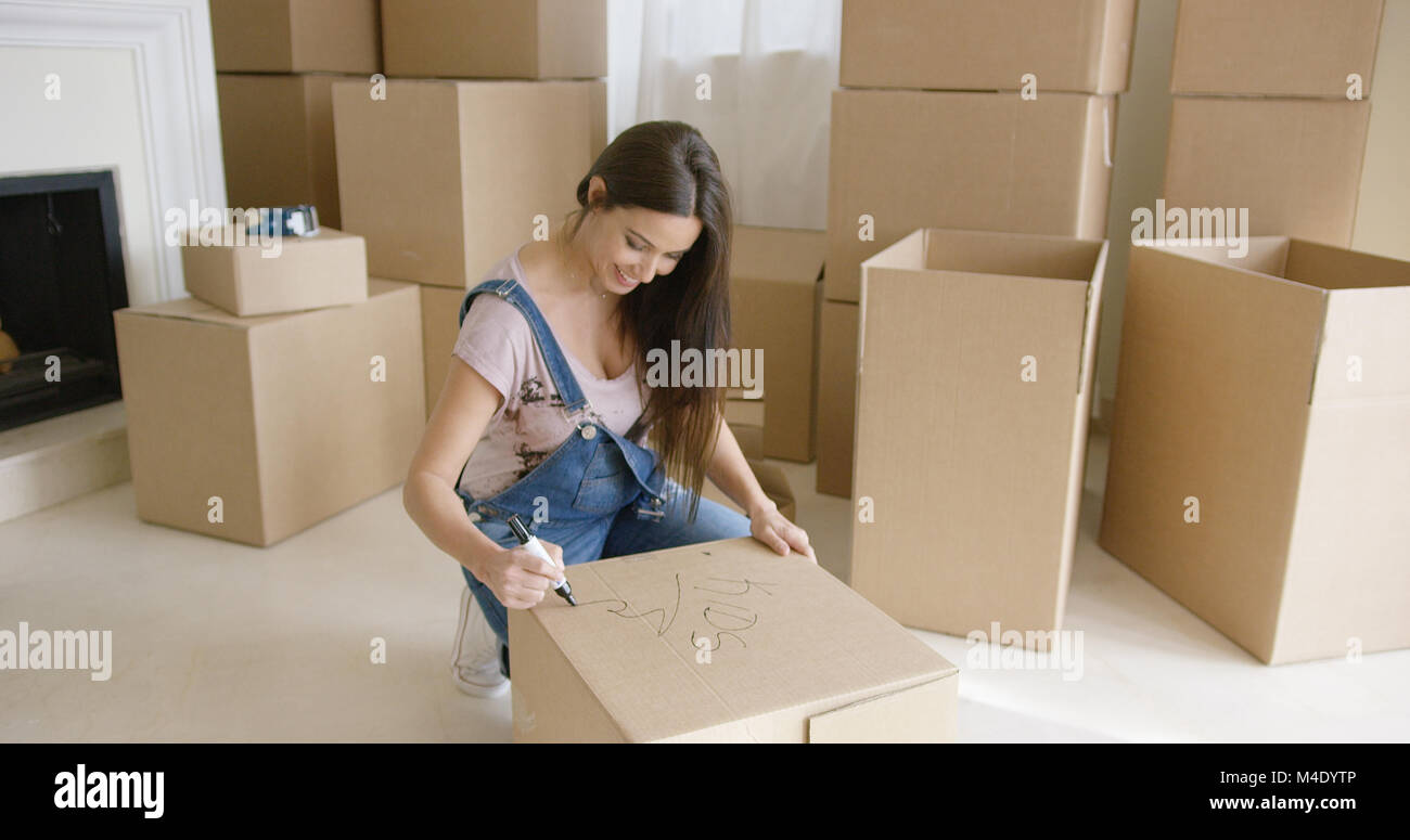 Woman packing up home hi-res stock photography and images - Alamy