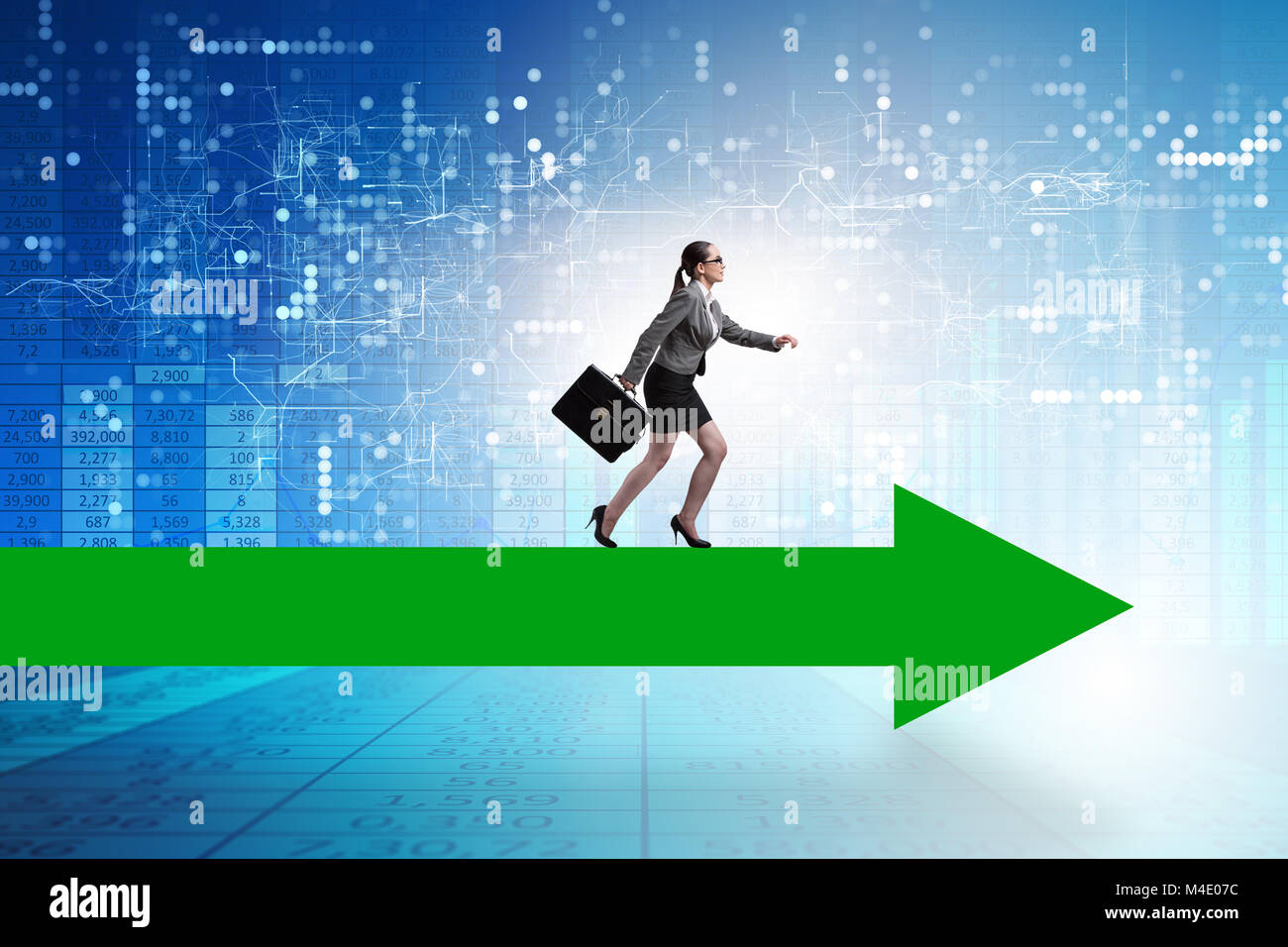 Businesswoman walking on arrow sign Stock Photo - Alamy