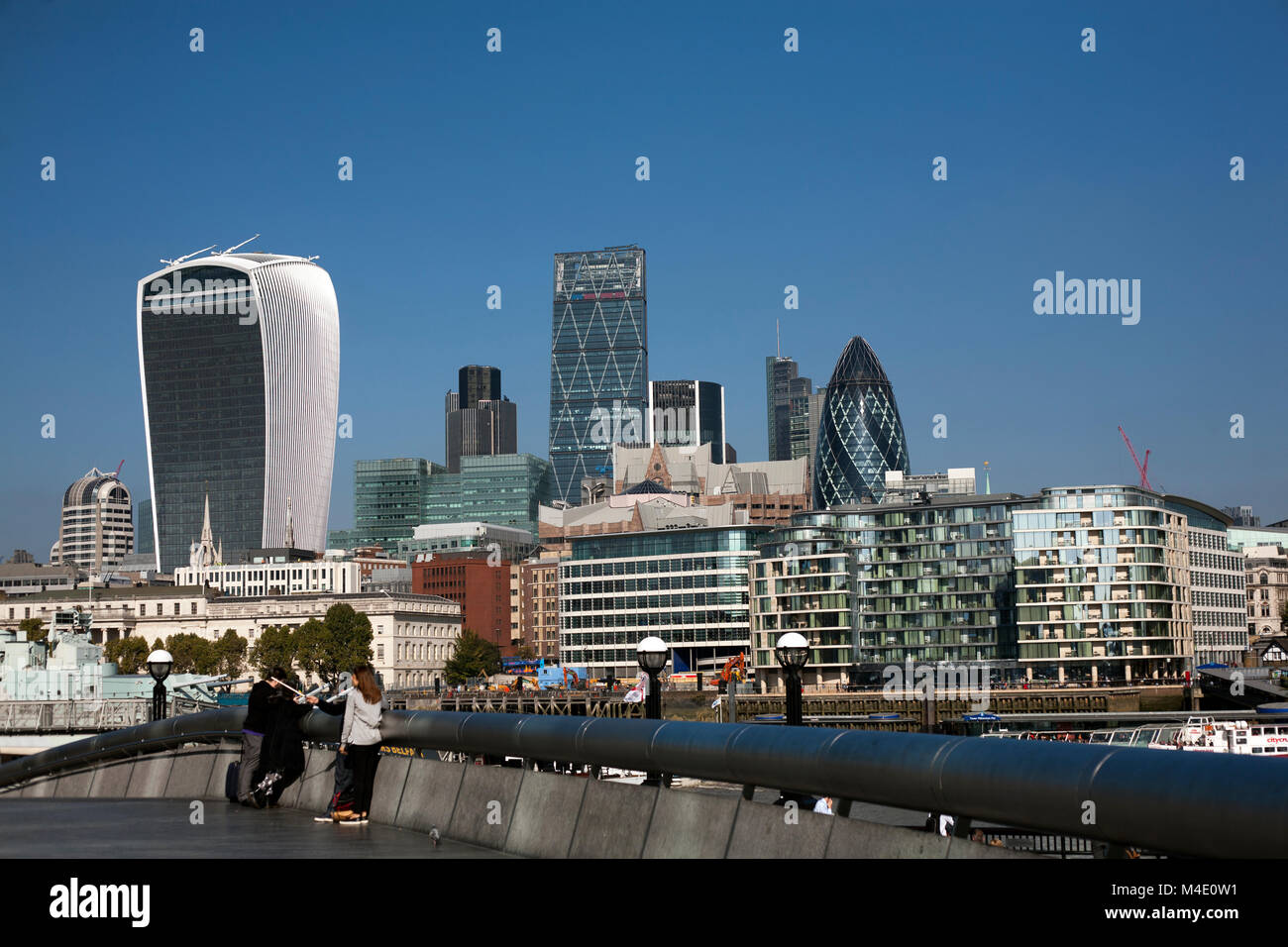 Colour Photograph of tourists looking out over the River Thames with ...