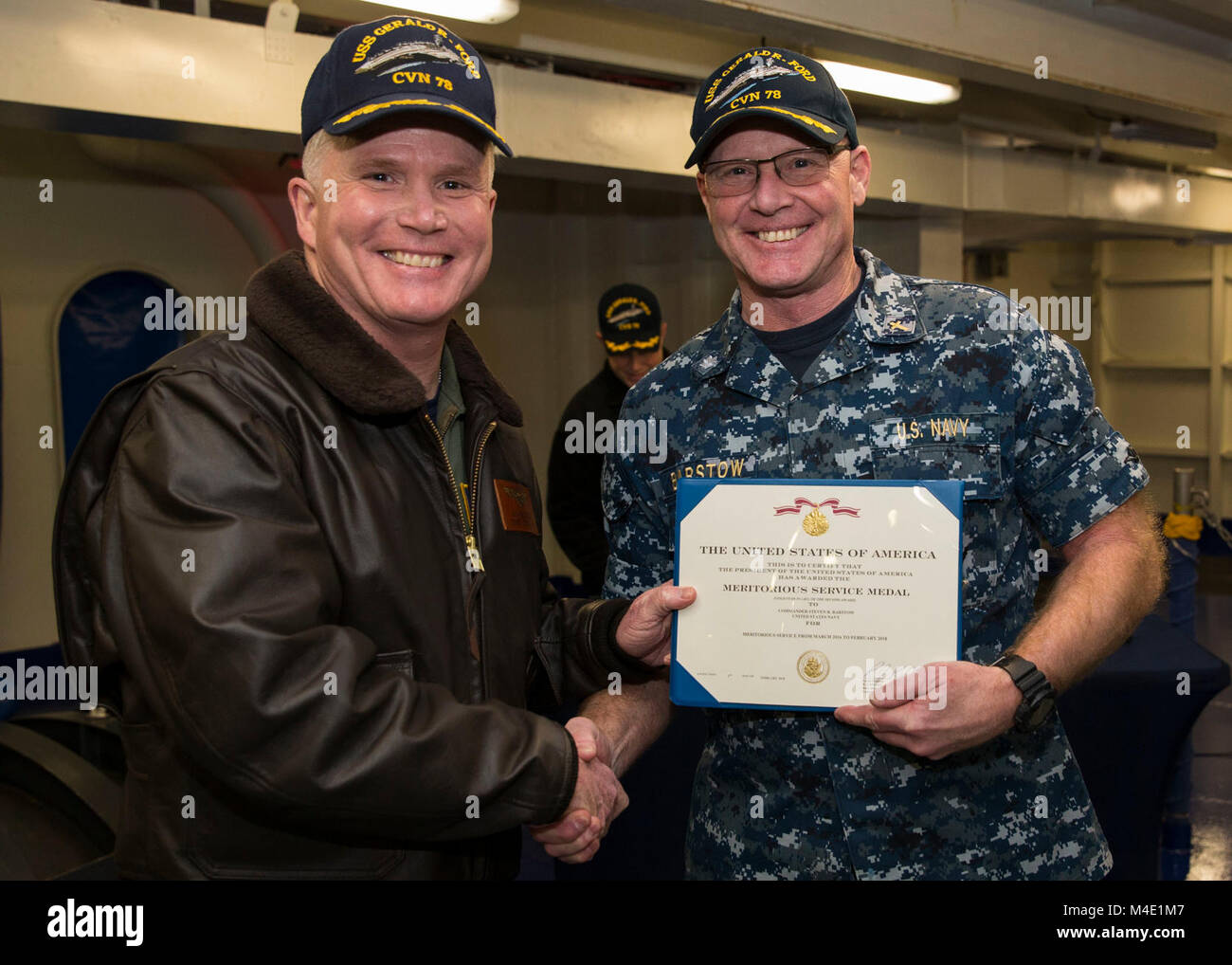 NORFOLK , Va. (Feb. 1, 2018) -- Cmdr. Steven Barstow (right), of ...