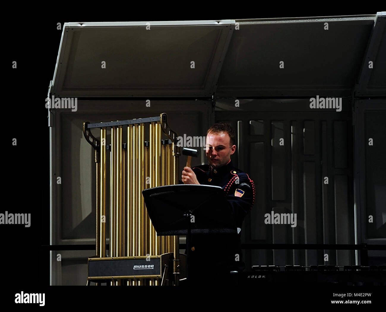 Petty Officer 1st Class Rob Langslet of the Coast Guard Band plays ...