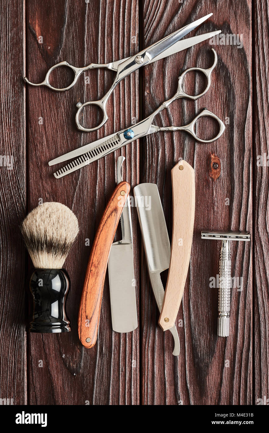 Vintage barber shop tools on wooden background Stock Photo - Alamy
