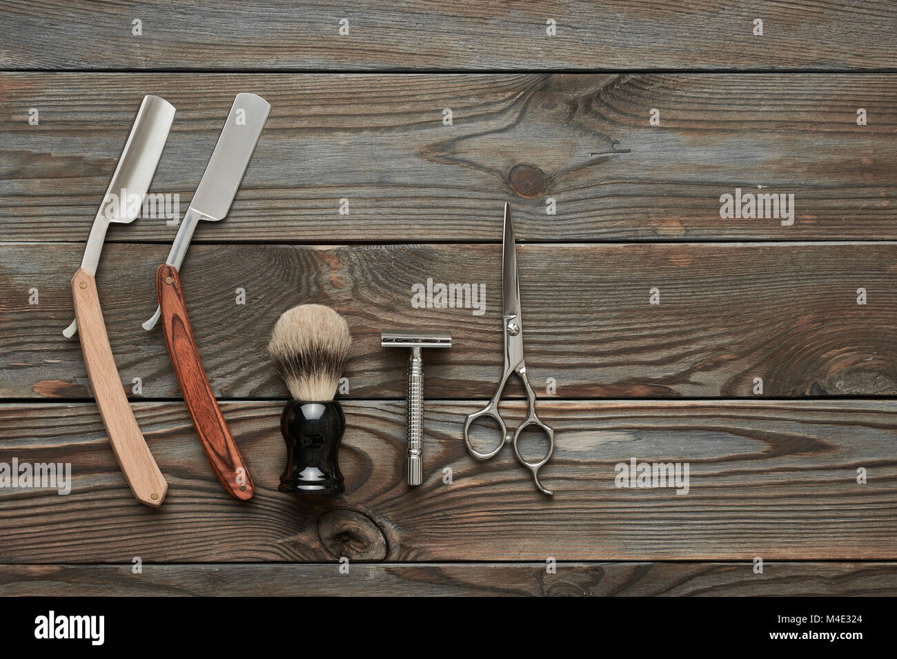 Vintage barber shop tools on wooden background Stock Photo - Alamy