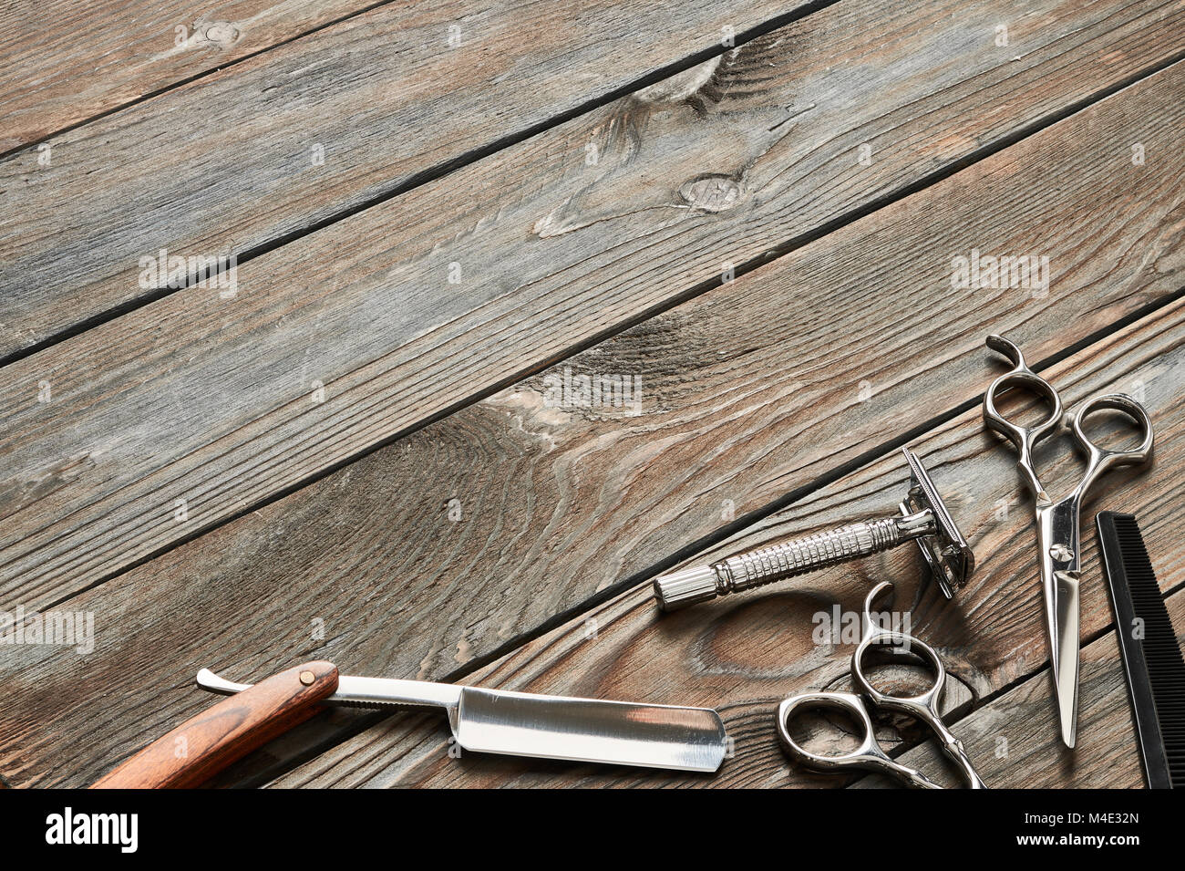 Vintage barber shop tools on wooden background Stock Photo - Alamy