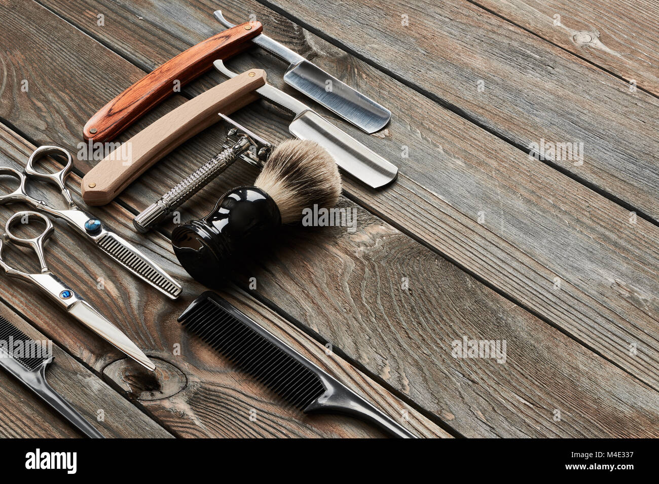 Vintage barber shop tools on wooden background Stock Photo - Alamy