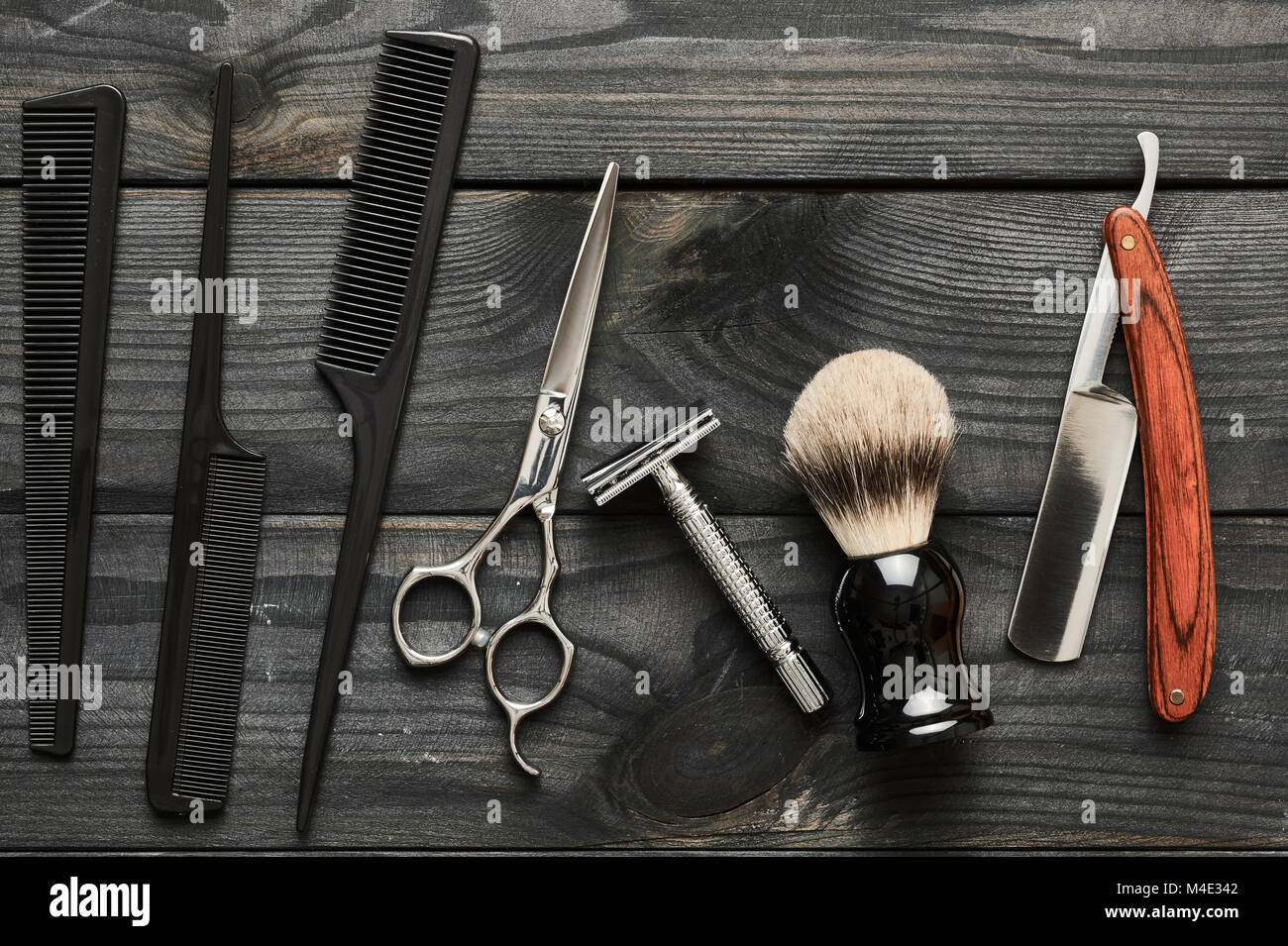 Vintage barber shop tools on wooden background Stock Photo - Alamy