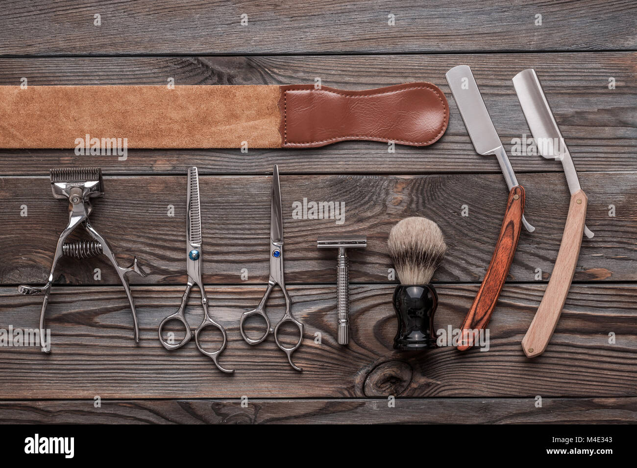 Vintage barber shop tools on wooden background Stock Photo - Alamy