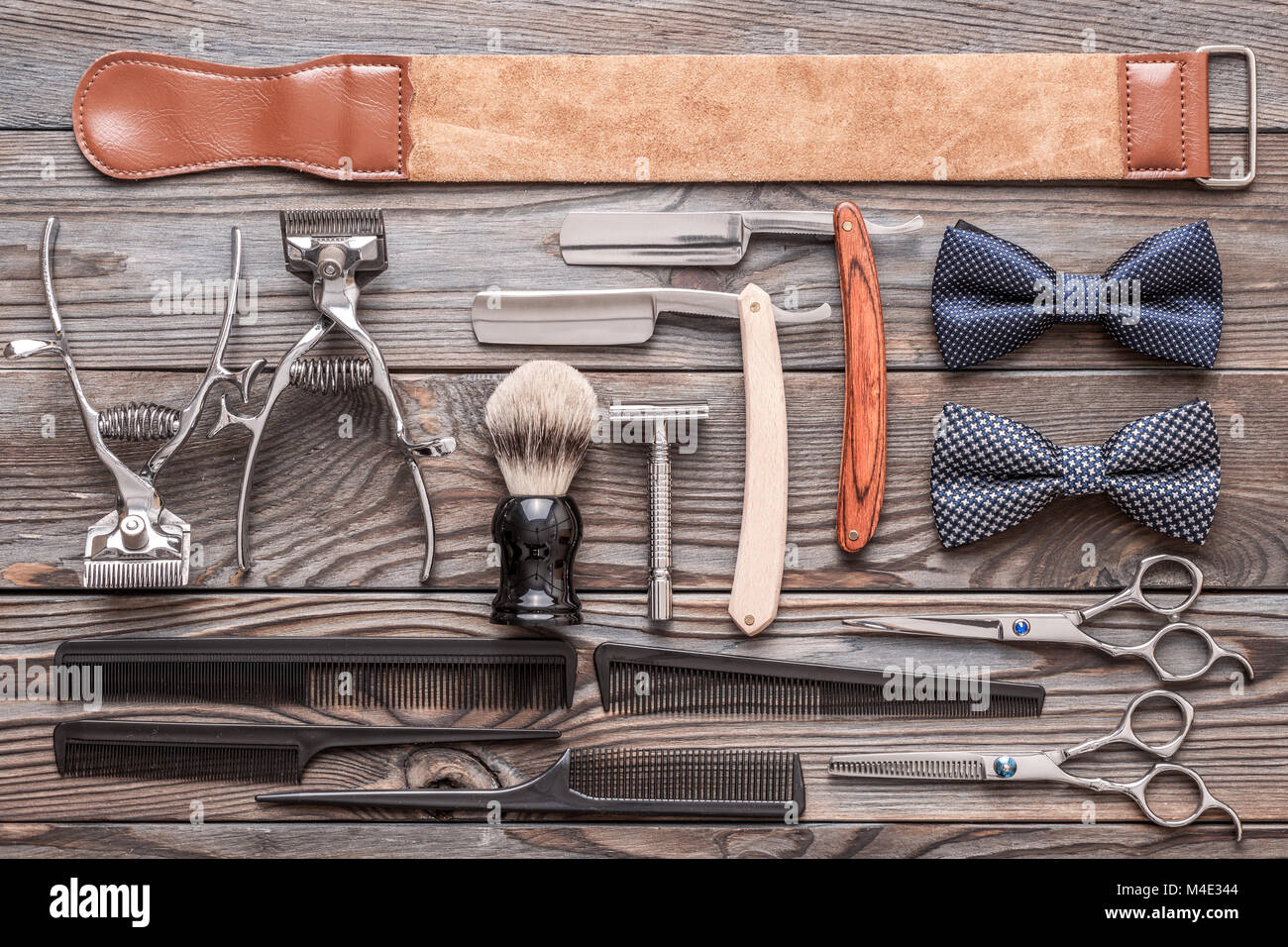 Vintage barber shop tools on wooden background Stock Photo - Alamy