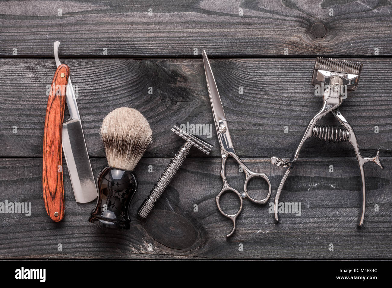 Vintage barber shop tools on wooden background Stock Photo - Alamy