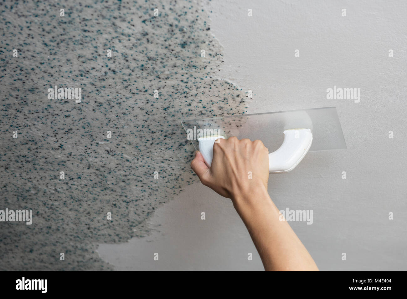 Pasting liquid wallpaper Stock Photo - Alamy