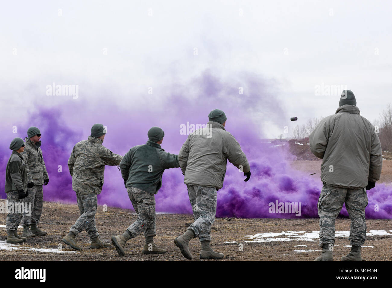 114th Security Forces Squadron members deploy smoke grenades during ...