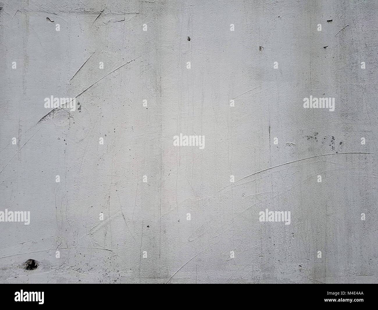 Abstract texture of white dirty city wall with stains of dirt and drips ...