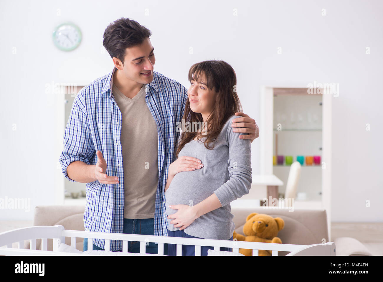Young parents expecting their first baby Stock Photo - Alamy