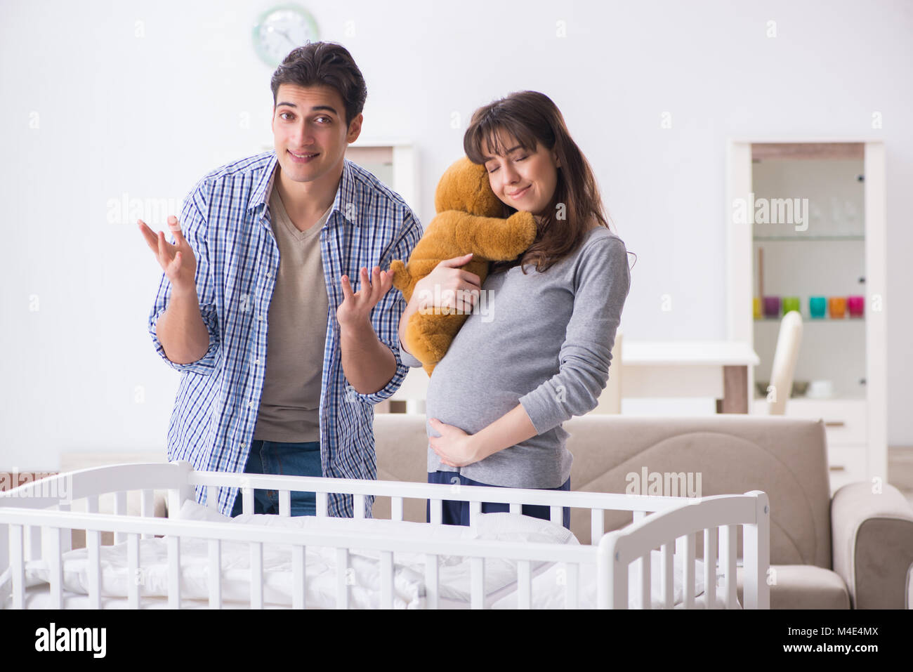 Young parents expecting their first baby Stock Photo - Alamy