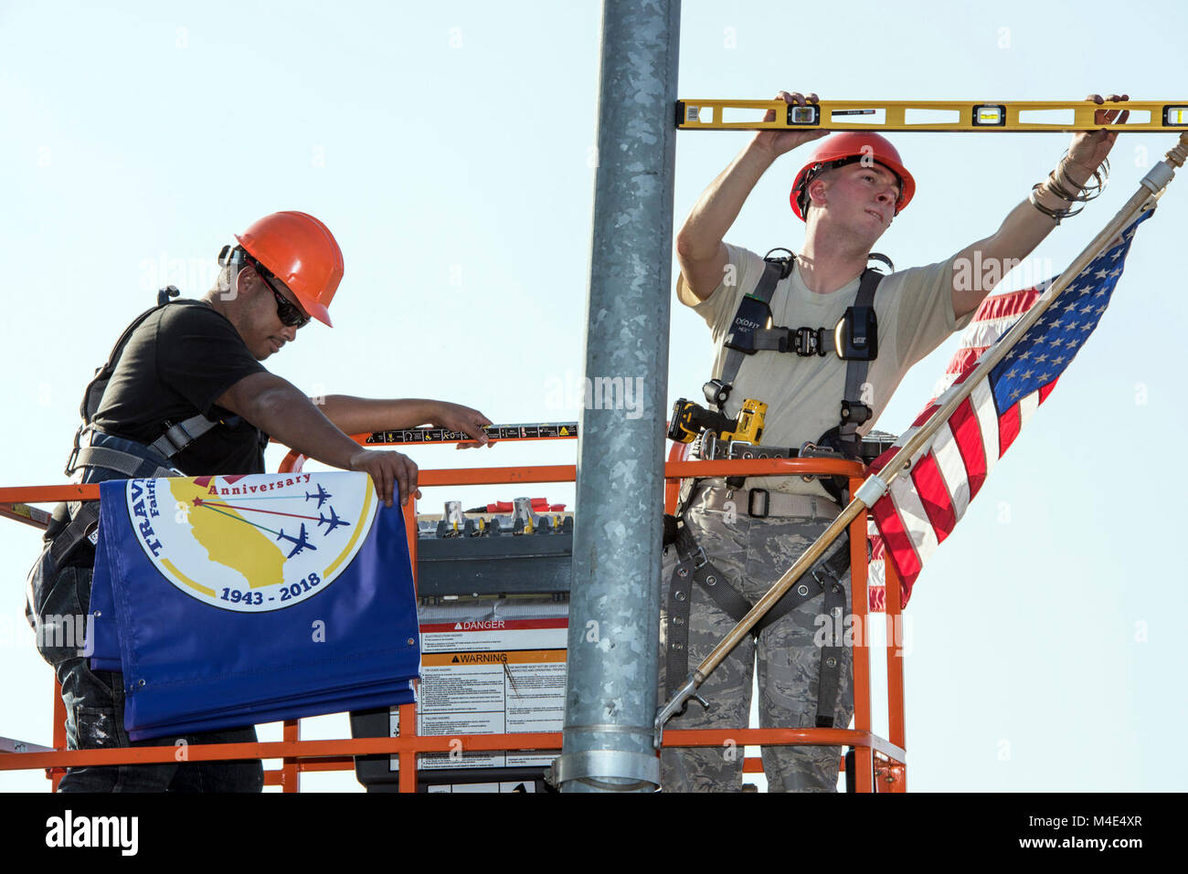 Members from the 60th Civil Engineer Squadron attach the 75th ...
