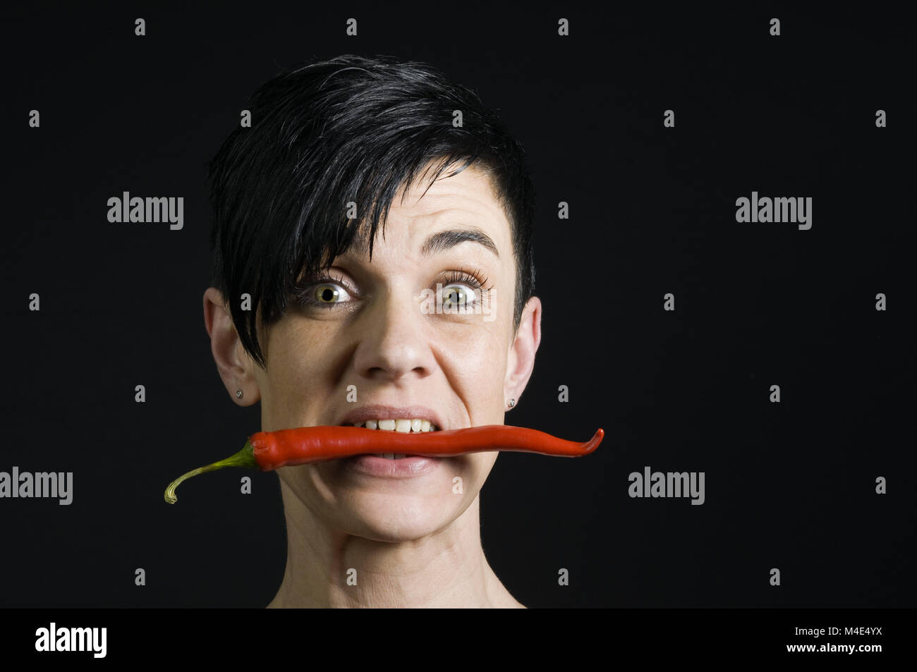 hot chilli in the mouth Stock Photo - Alamy